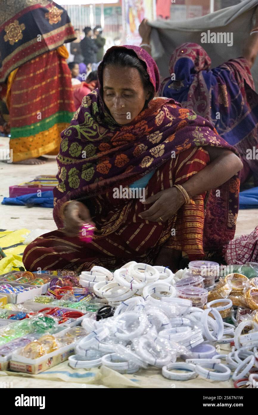 Local and Indian vendors sell flowers, bangles, and food offerings in ...