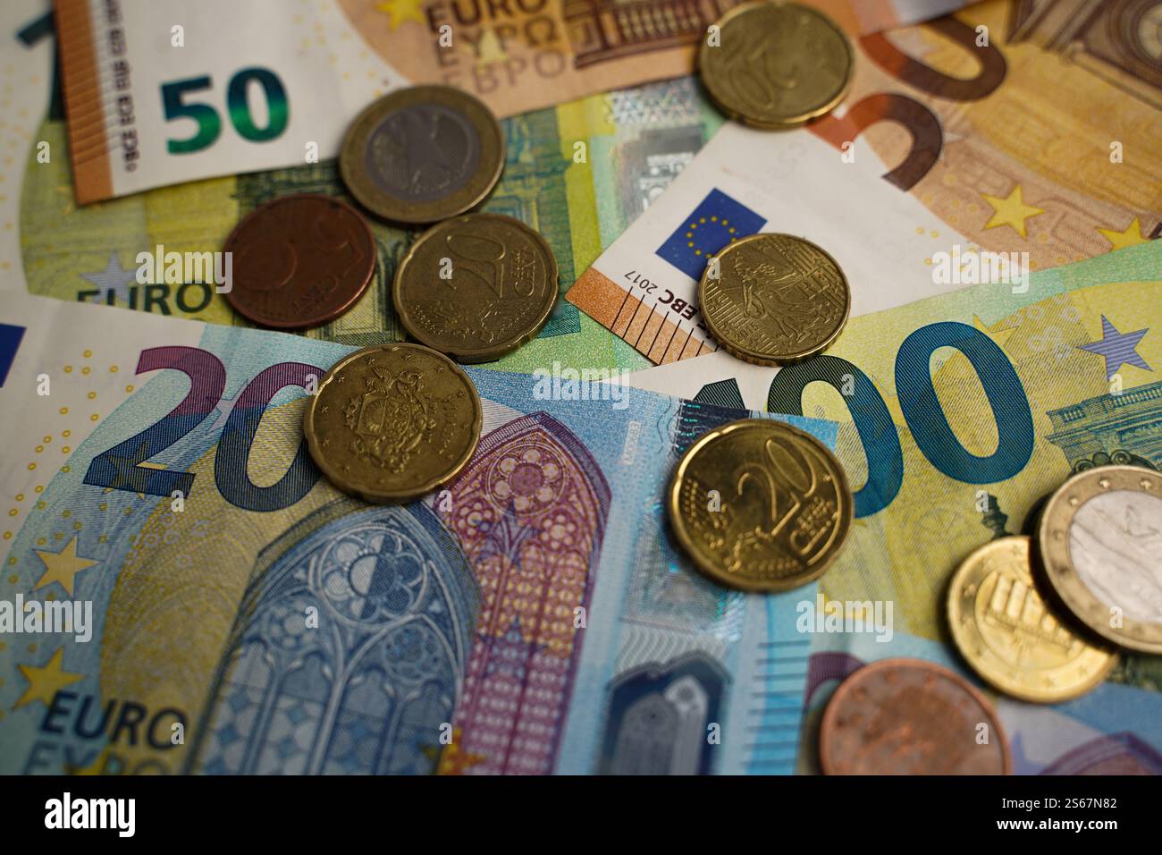 euro banknotes and coins, money background, different euro ...
