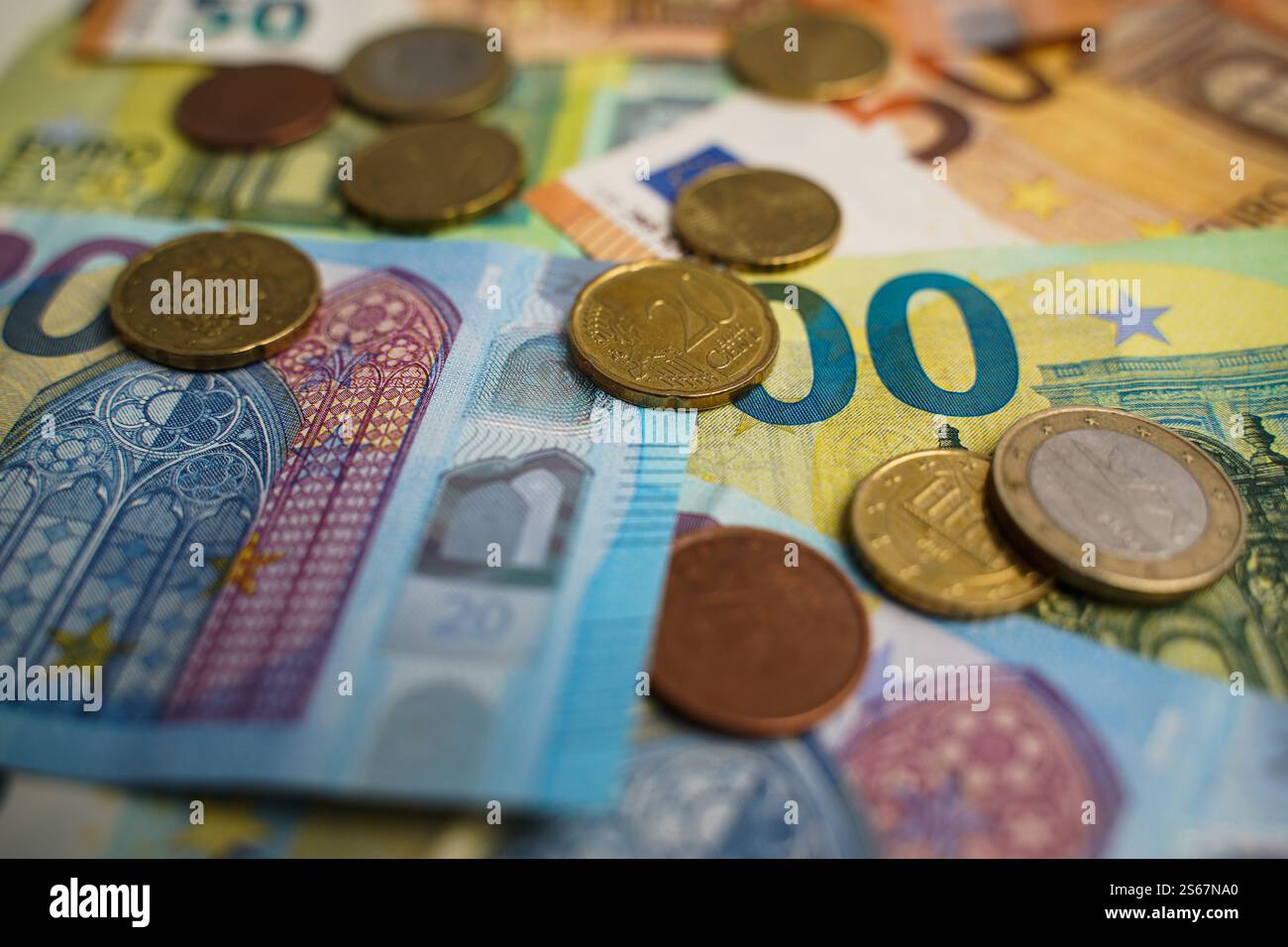 euro banknotes and coins, money background, different euro ...