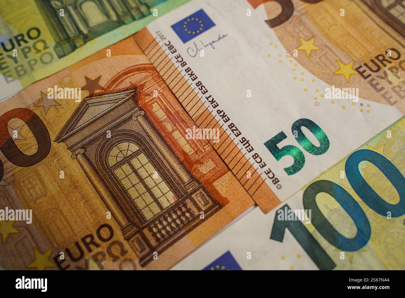 Lots of different Euro banknotes shown as a mess Stock Photo - Alamy