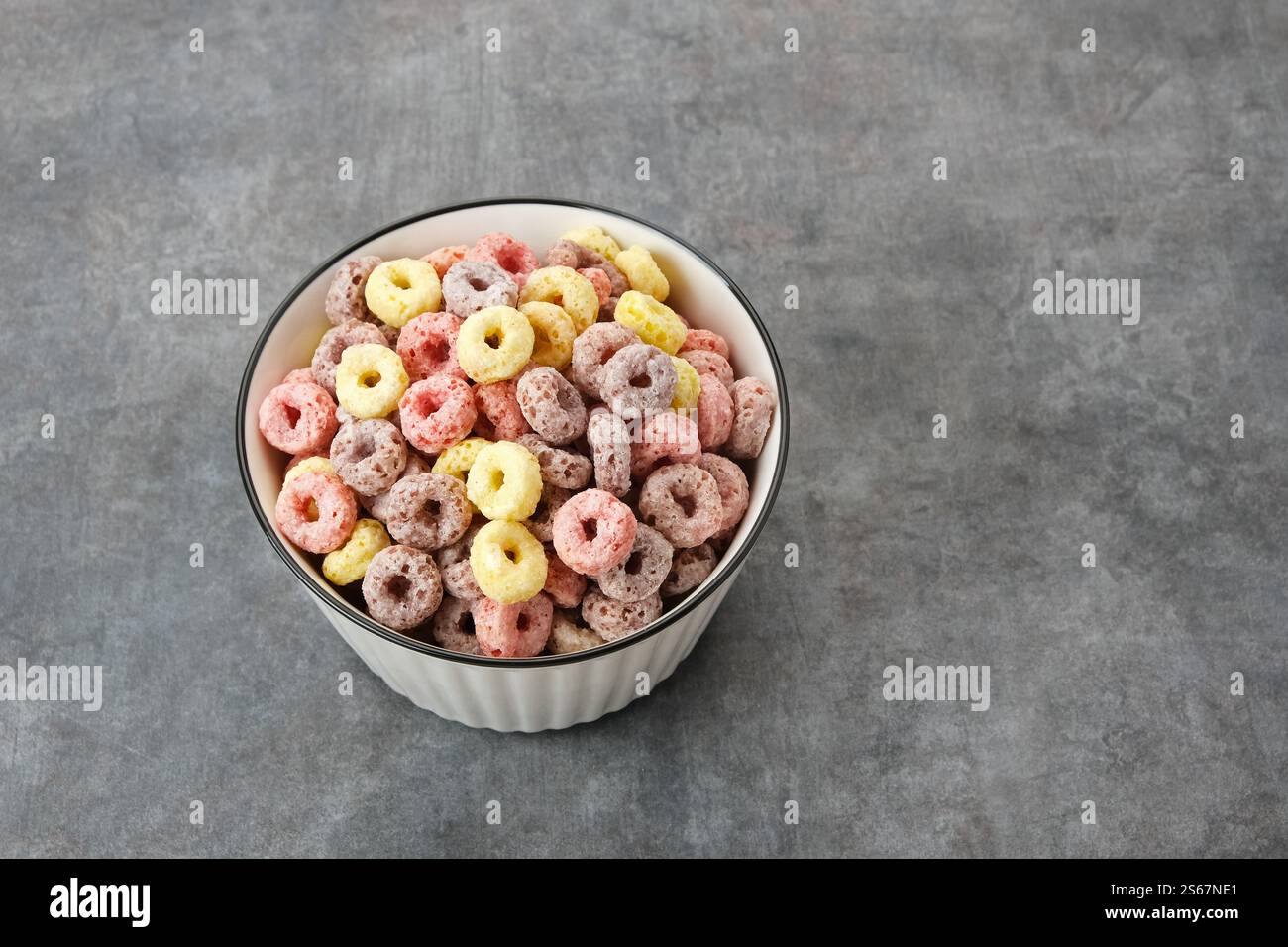 Bowl of colorful cereal ring, sweet crunchy Stock Photo - Alamy