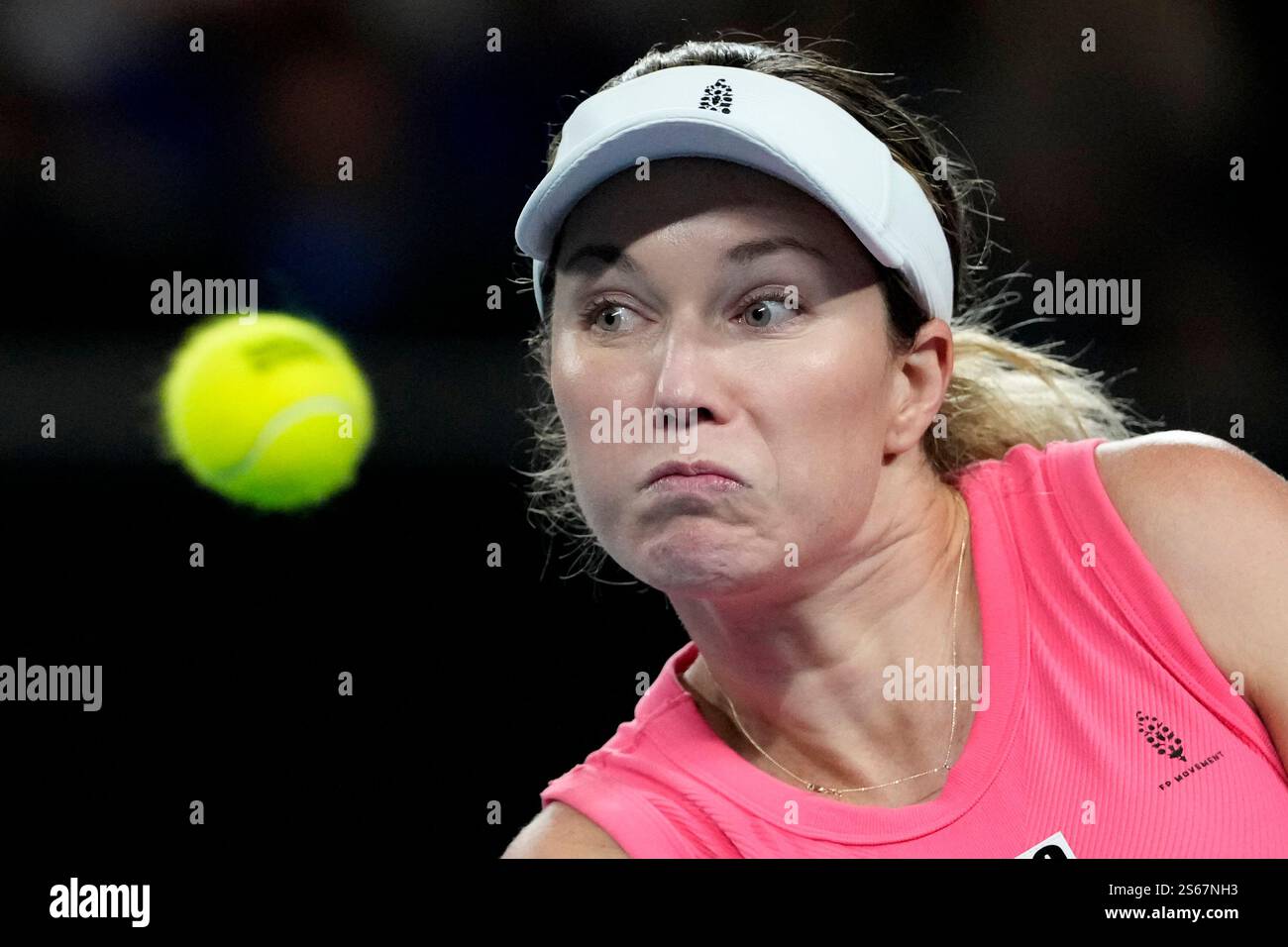 Danielle Collins of the U.S. plays a backhand return to Destanee Aiava ...