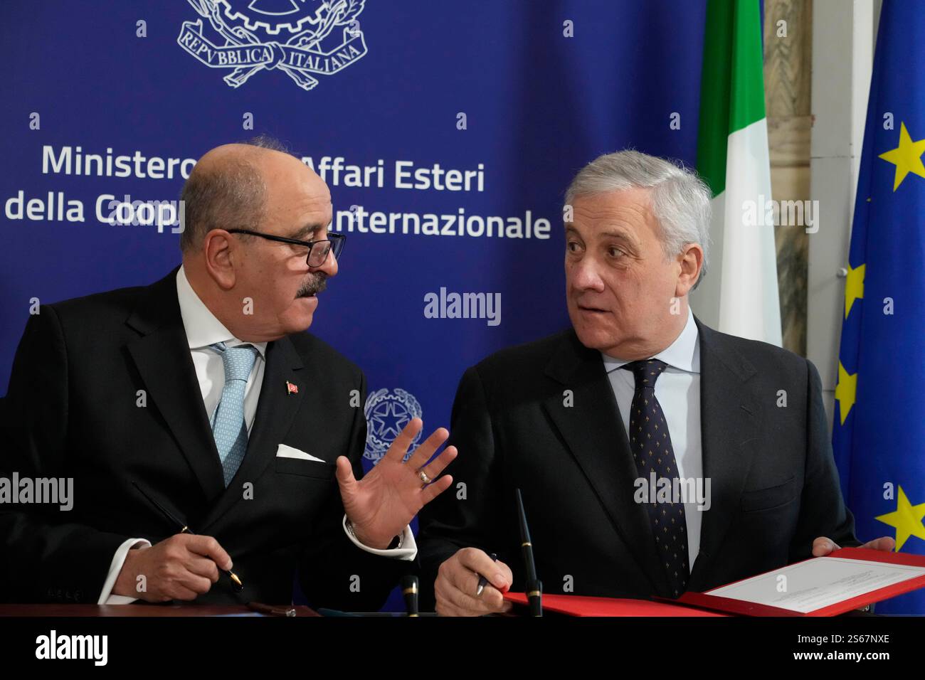 Italian Foreign Minister Antonio Tajani, right, and his Tunisian ...