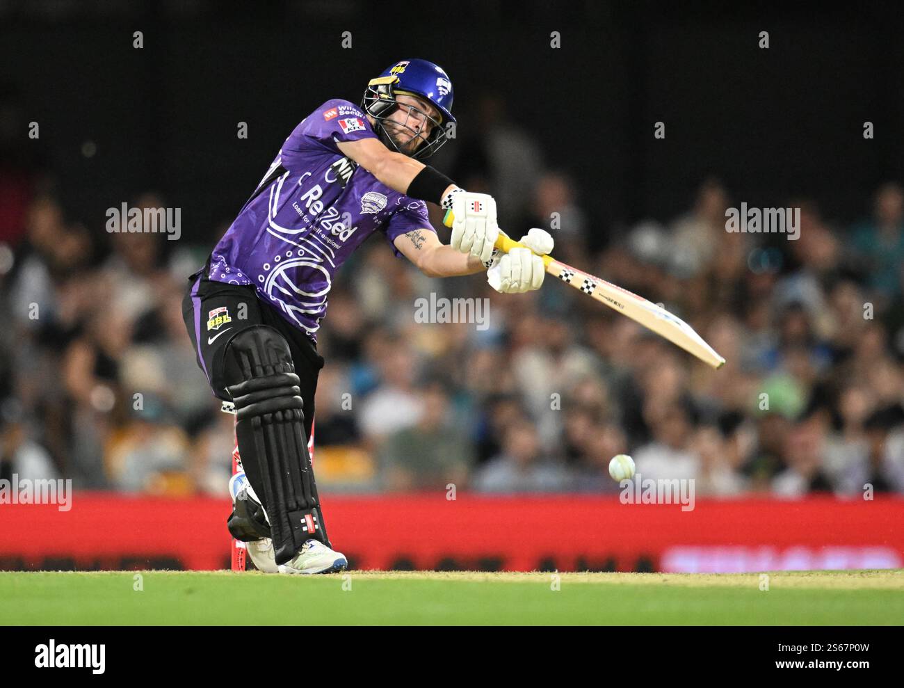 Caleb Jewell of the Hurricanes hits runs during the Big Bash League ...