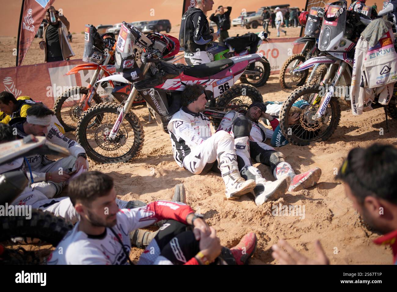 Riders wait at the start delayed due to fog during the eleventh stage ...