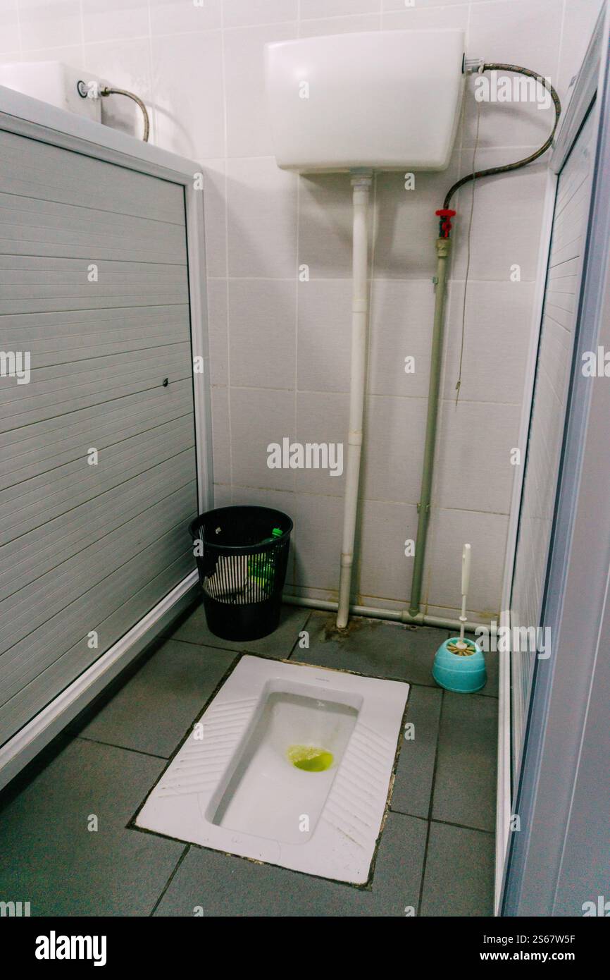 paid Muslim toilet. toilet stall in the bazaar of Kazakhstan Stock ...