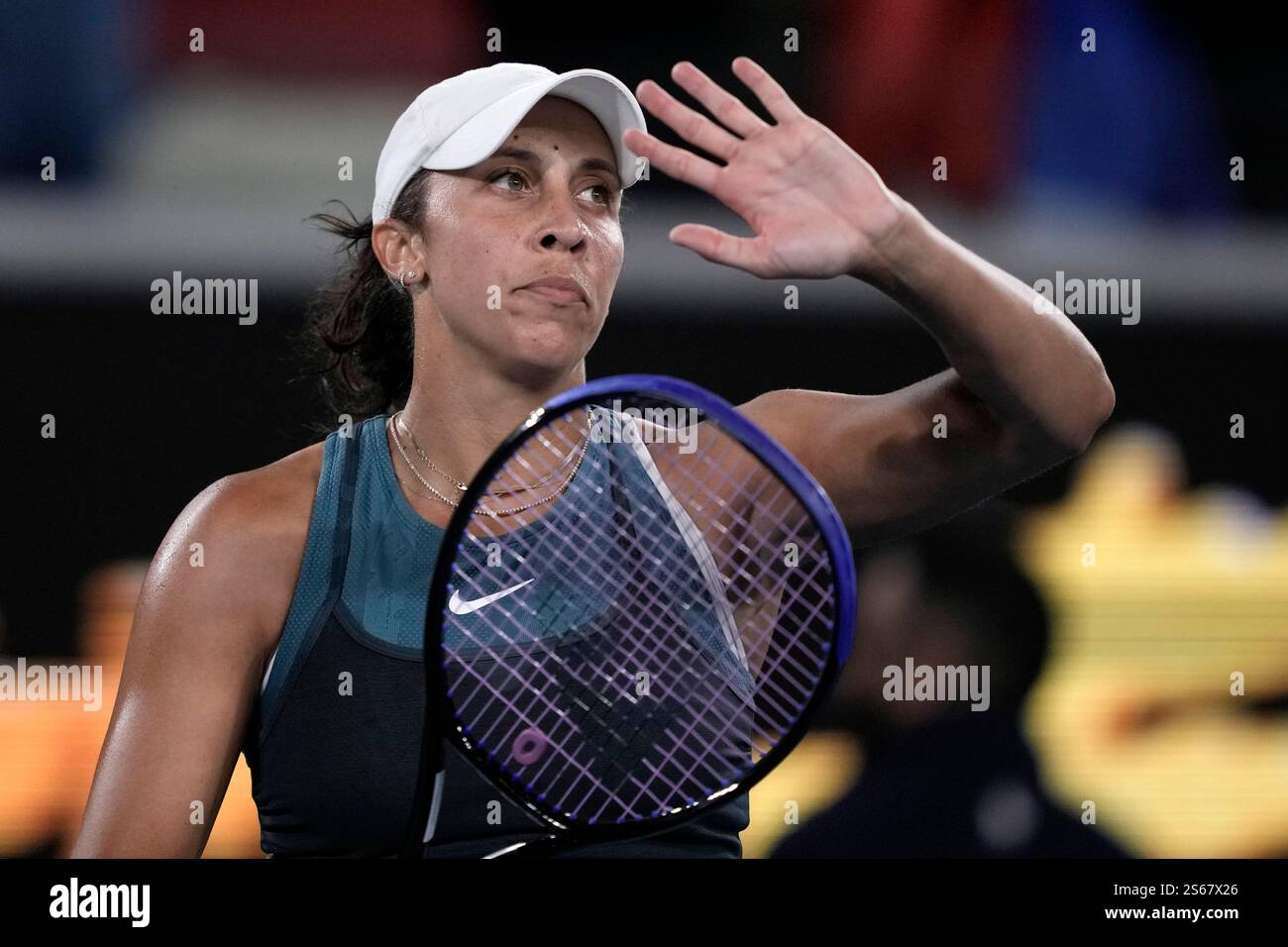 Madison Keys of the U.S. waves after defeating Elena-Gabriela Ruse of Romania in their second ...