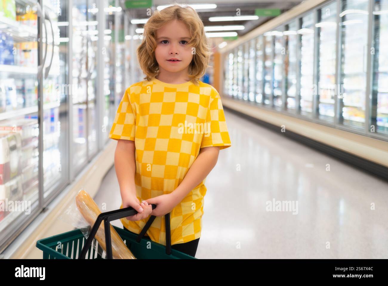 Little child choosing food in grocery store or a supermarket Stock ...