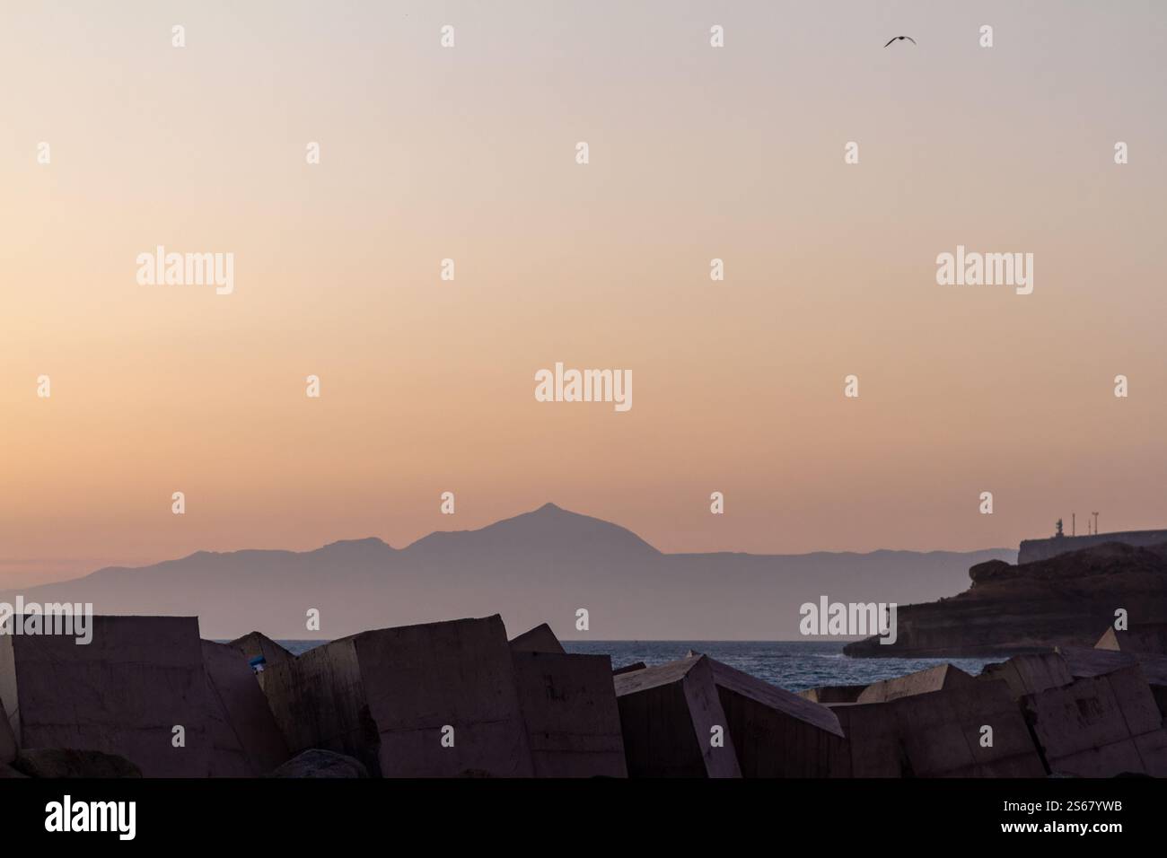 High-resolution sunset landscape featuring Mount Teide in the distance ...