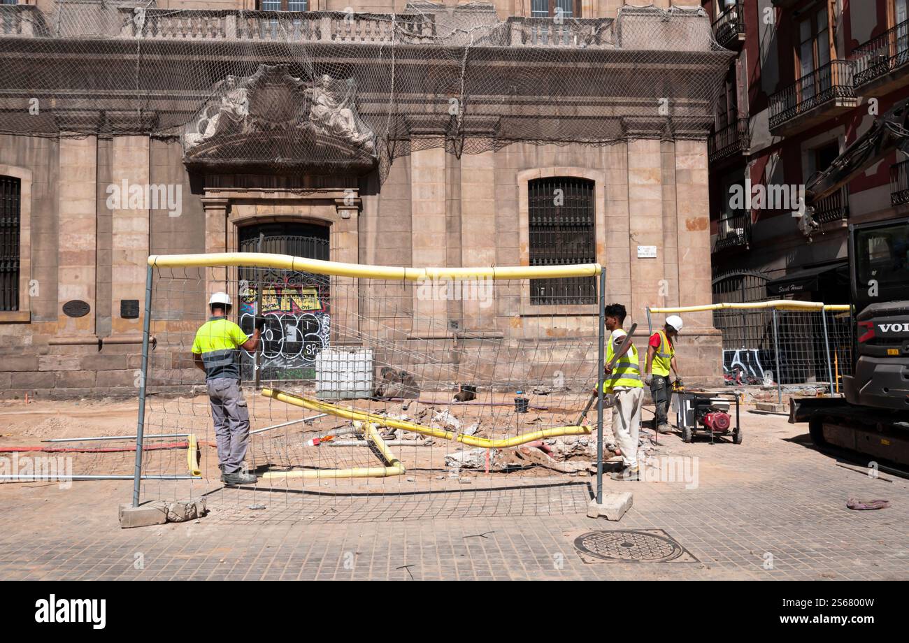 Moroccan workers working on public works on the Rambla Santa Mónica ...
