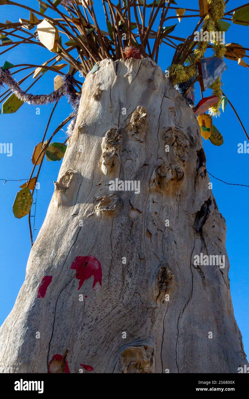 Unique artistic tree design with colorful decorations, celebrating ...