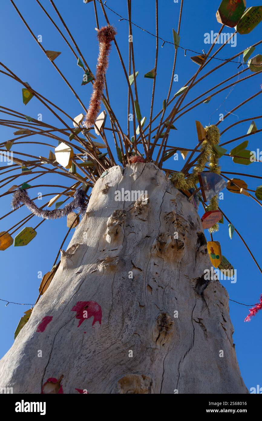 Decorative art installation resembling a tree, crafted with vibrant ...