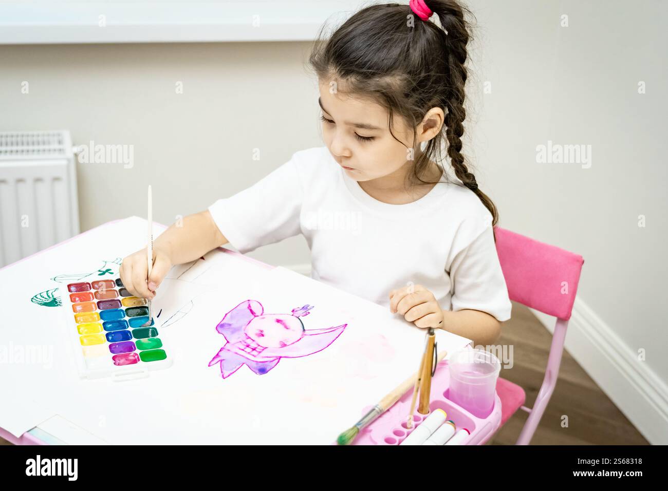 child painting a picture with school supplies, preschool child painting ...