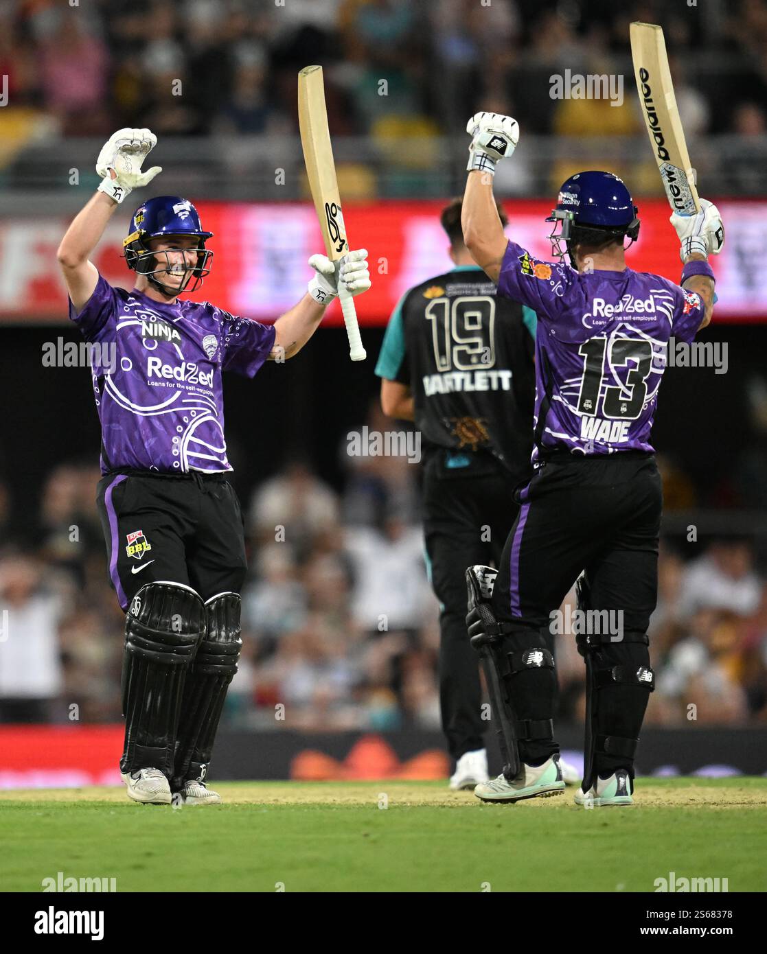 Jake Doran (left) and Matthew Wade (right) of the Hurricanes celebrate ...