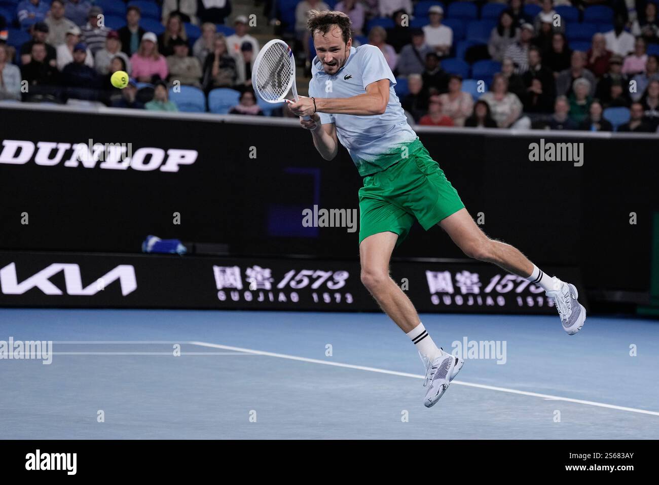 Daniil Medvedev of Russia plays a backhand return to Learner Tien of ...