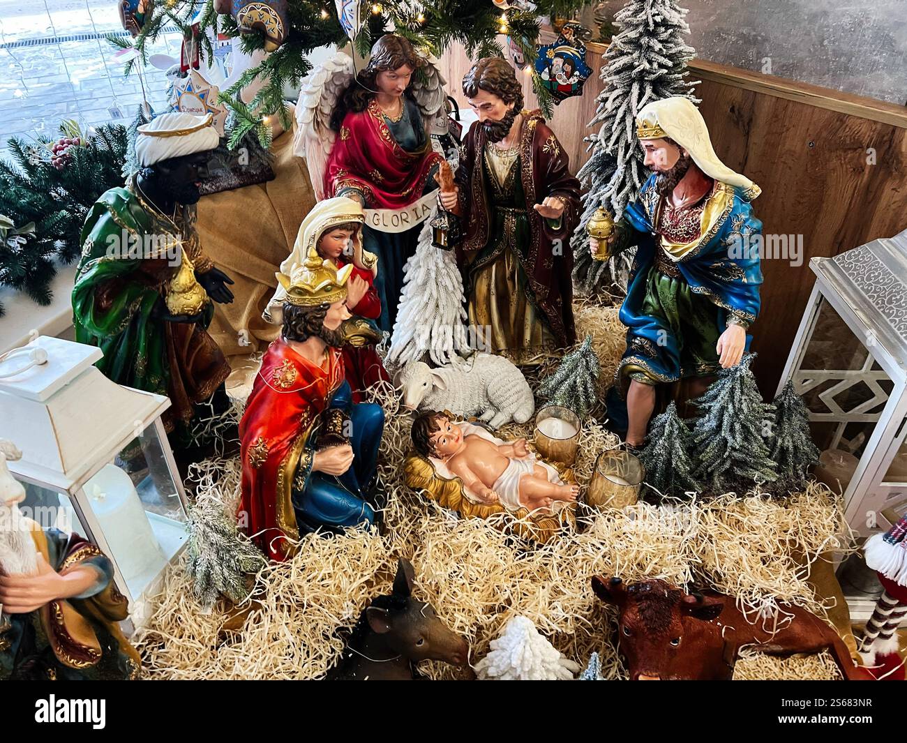 Nativity scene displaying figurines including Mary, Joseph, infant ...