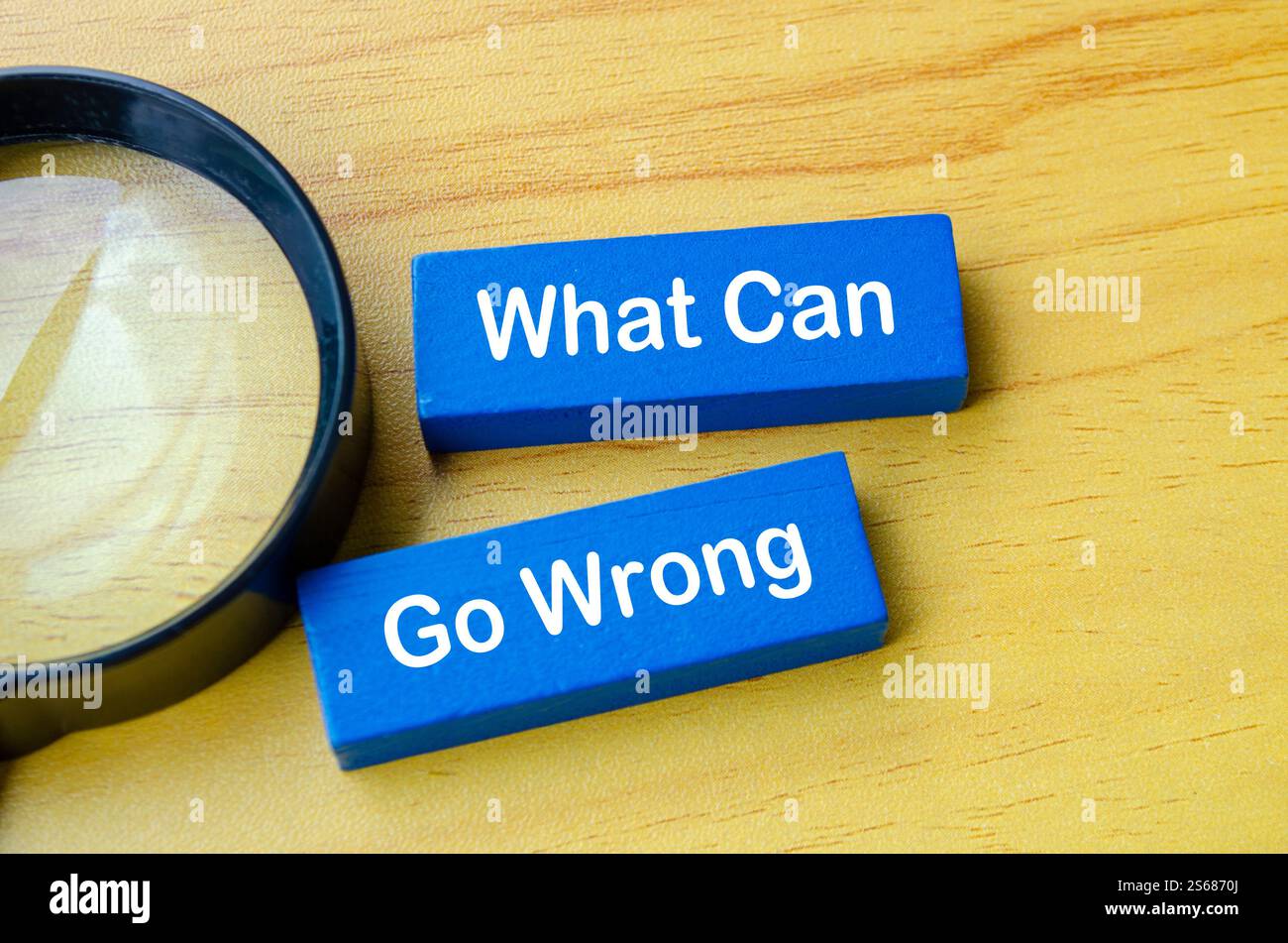Top view of What Can Go Wrong text on blue wooden blocks with ...