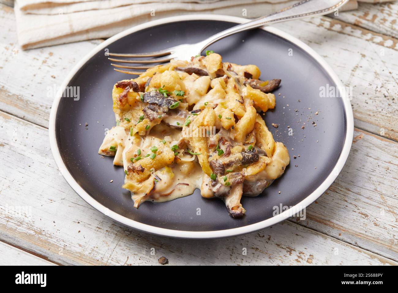 Mushroom Leek and Spaetzle Bake Stock Photo - Alamy