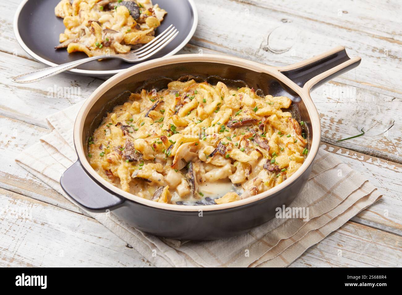Mushroom Leek and Spaetzle Bake Stock Photo - Alamy