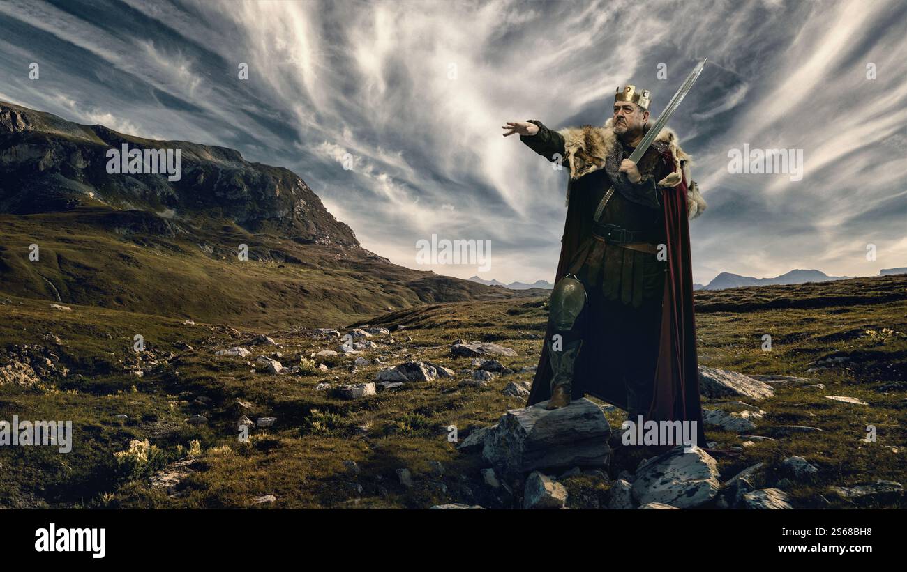 Medieval bearded man, king in golden crown, fur-lined cloak, and armor ...