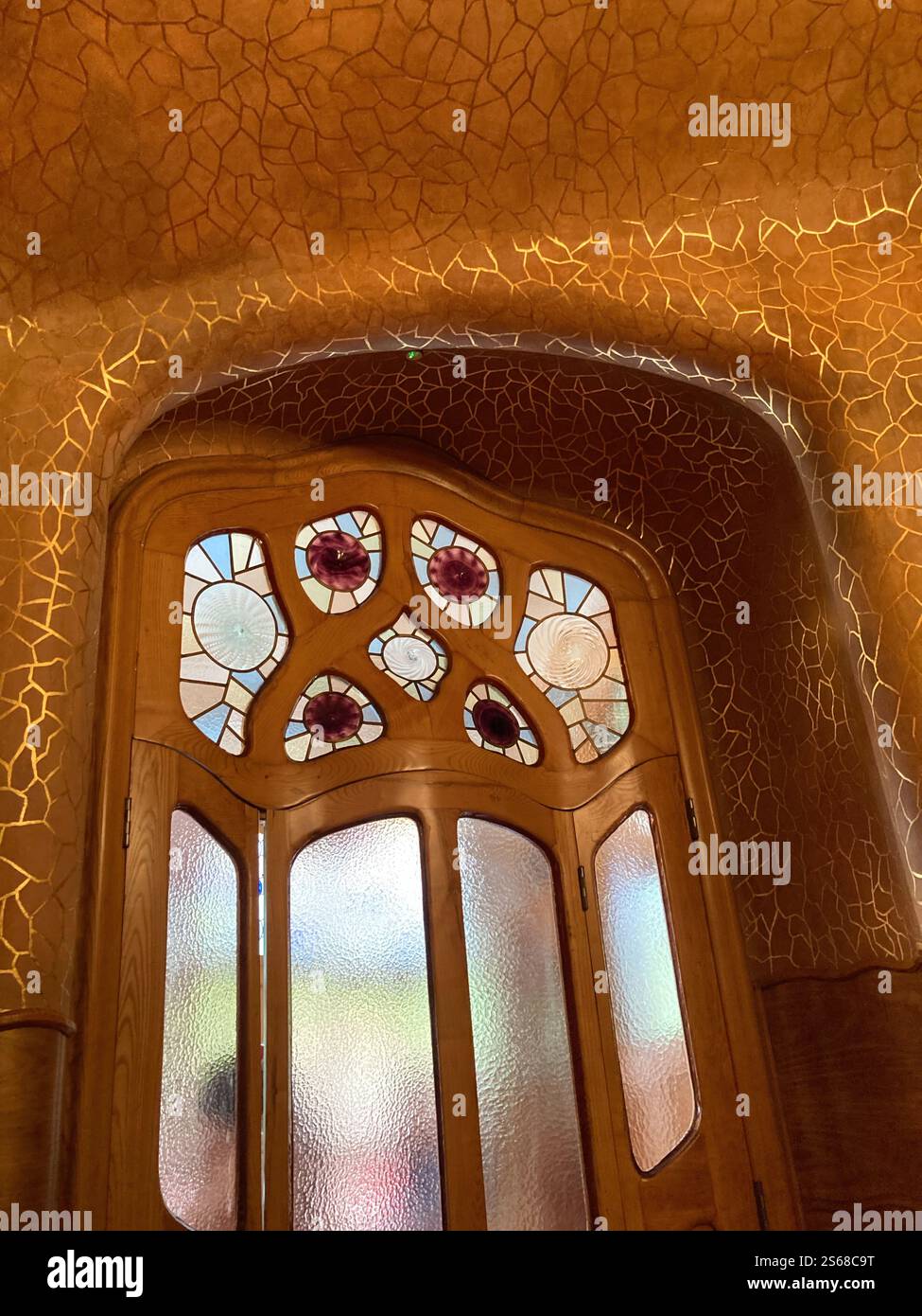Stained glass window from inside, Casa Batlló house by Antoni Gaudí ...