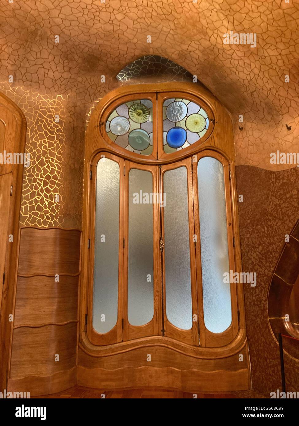 Stained glass window from inside, Casa Batlló house by Antoni Gaudí ...