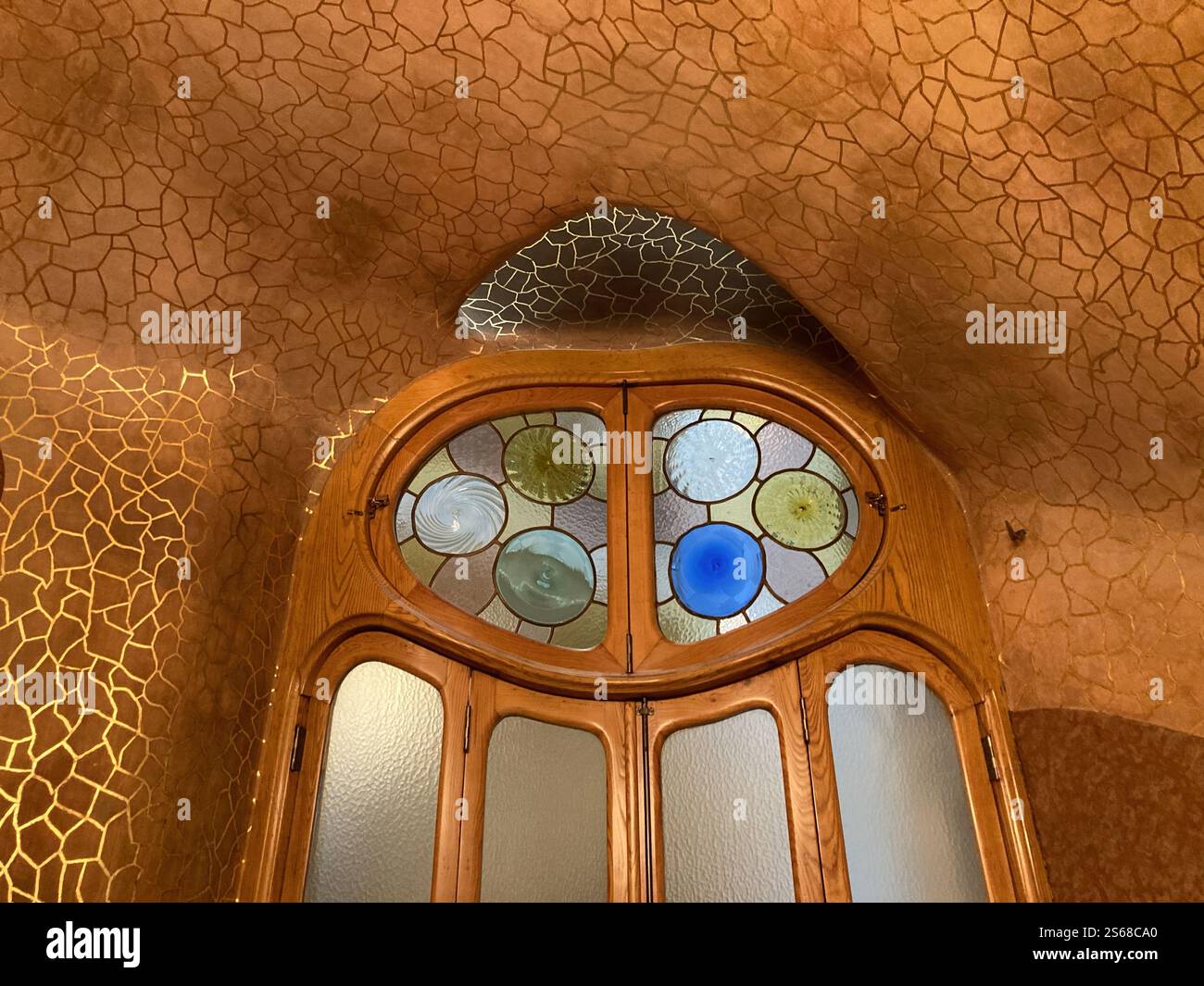Stained glass window from inside, Casa Batlló house by Antoni Gaudí ...
