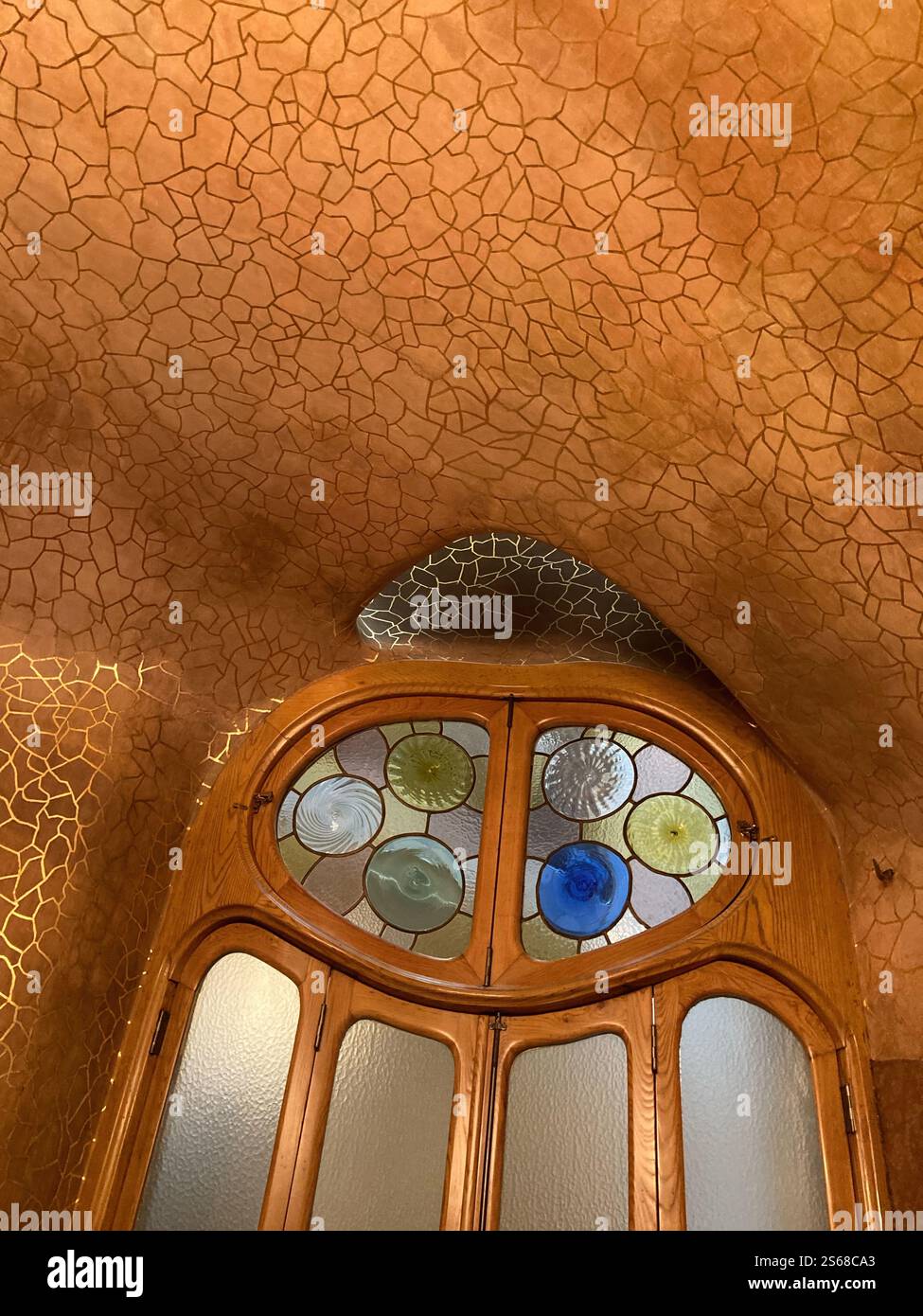 Stained glass window from inside, Casa Batlló house by Antoni Gaudí ...