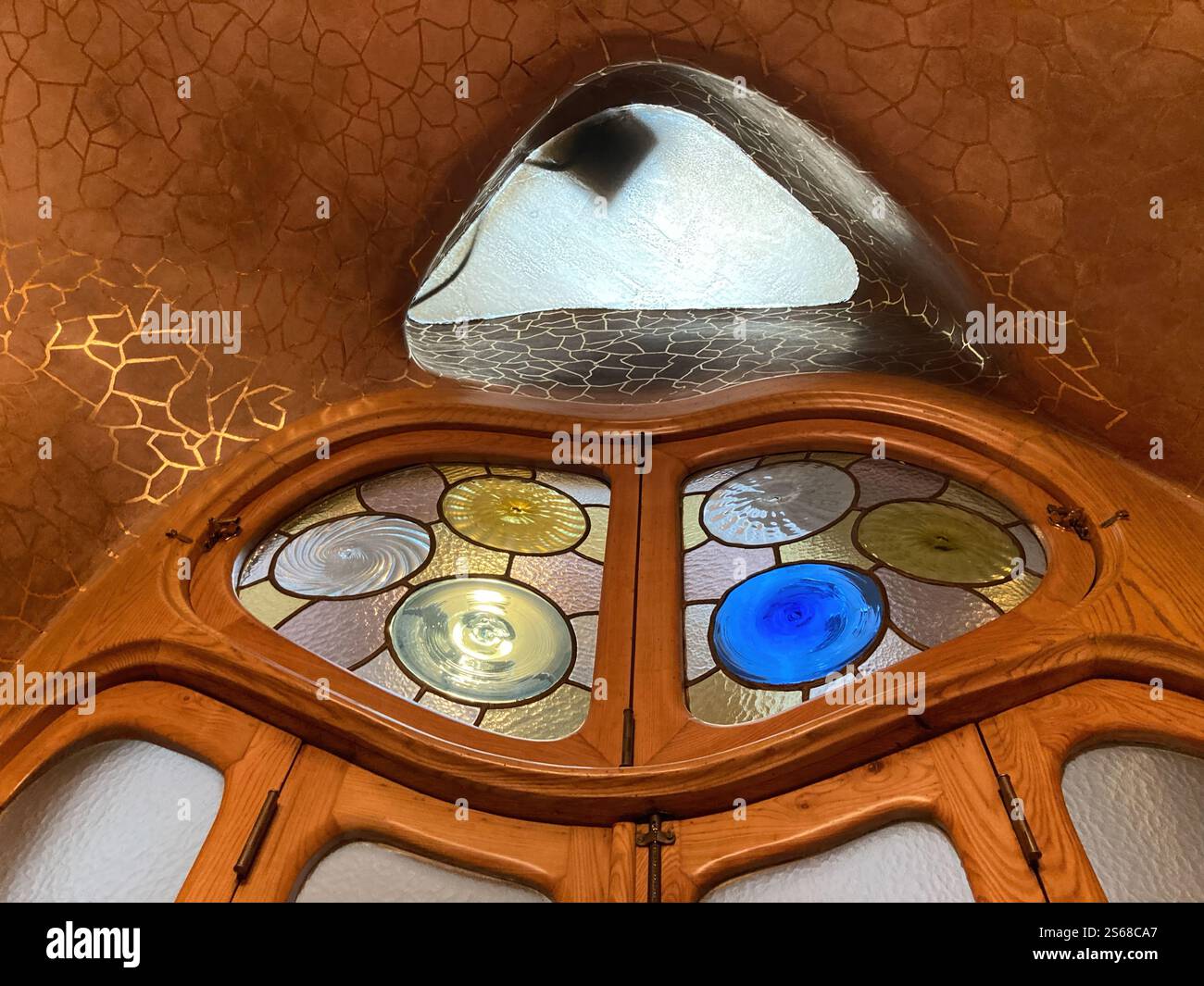 Stained glass window from inside, Casa Batlló house by Antoni Gaudí ...