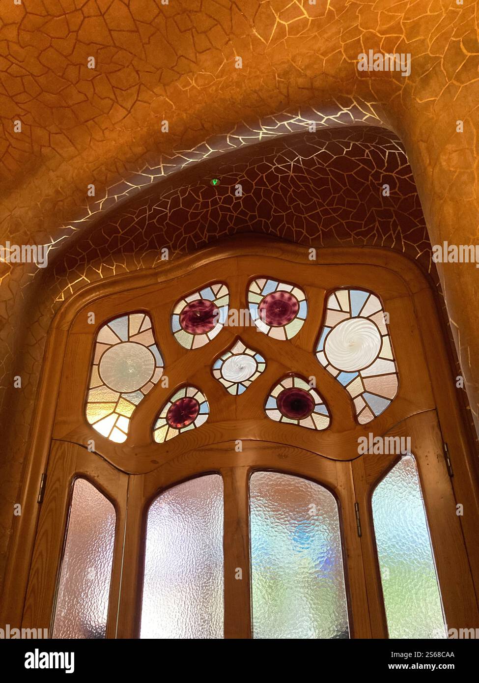 Stained glass window from inside, Casa Batlló house by Antoni Gaudí ...