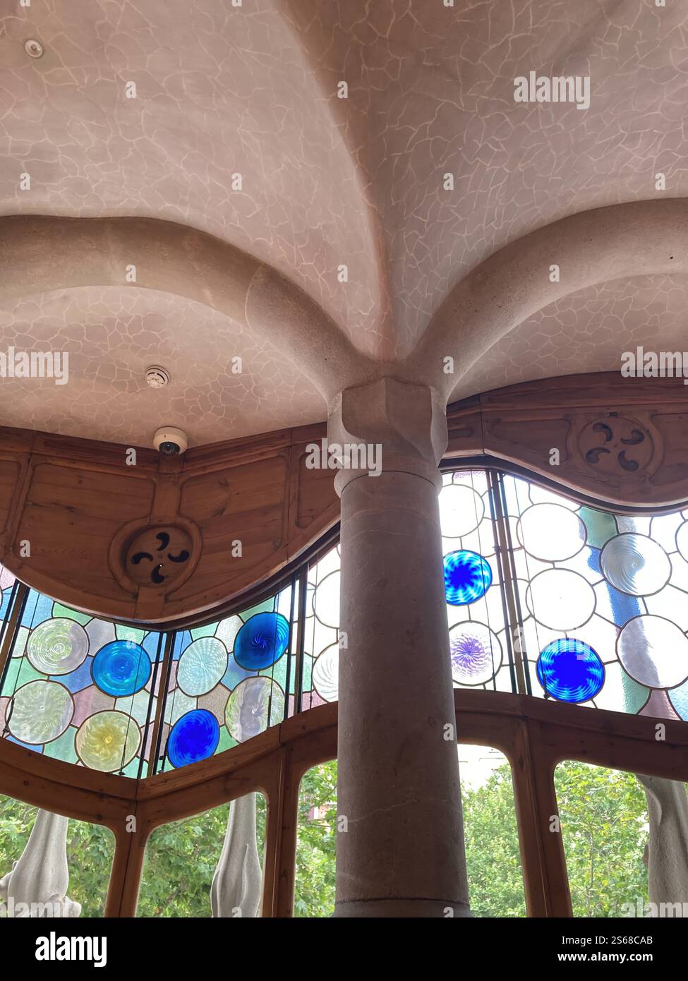 Stained glass window from inside, Casa Batlló house by Antoni Gaudí architect. Barcelona ...