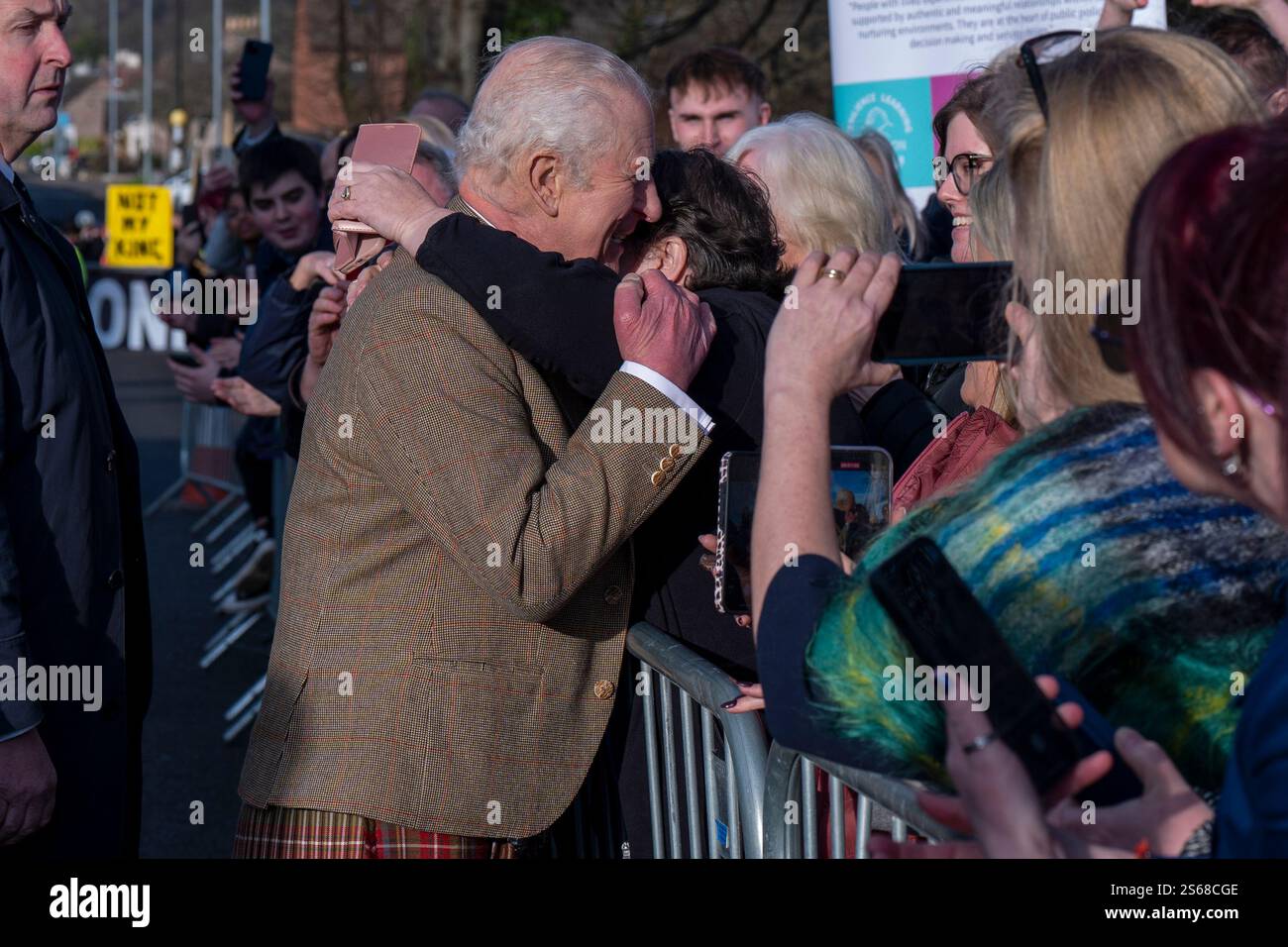 Britain's King Charles III hugs a well wisher during his visit to The ...