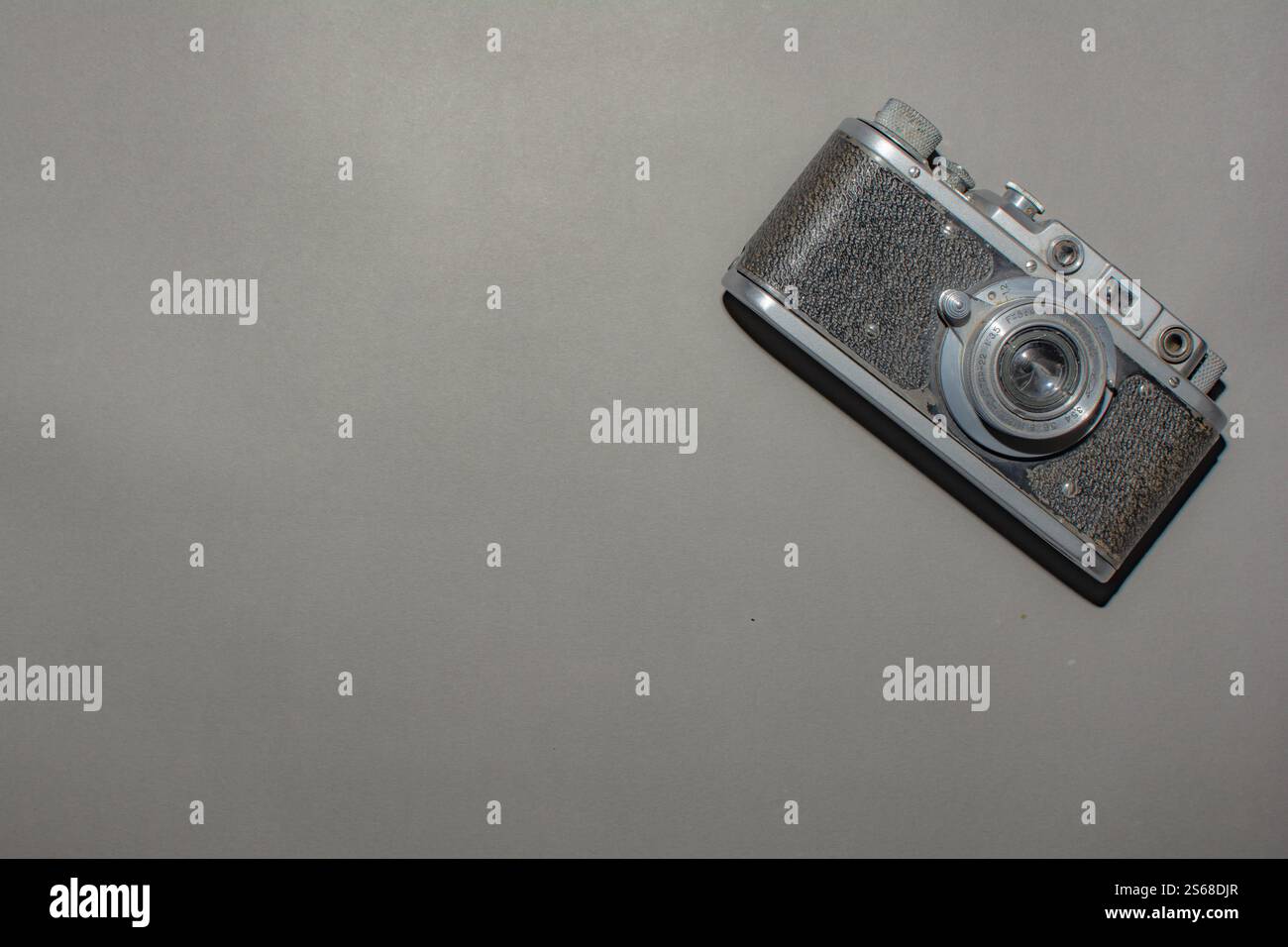 Old photo cameras with a metal body, unique design and lens. Camera for ...