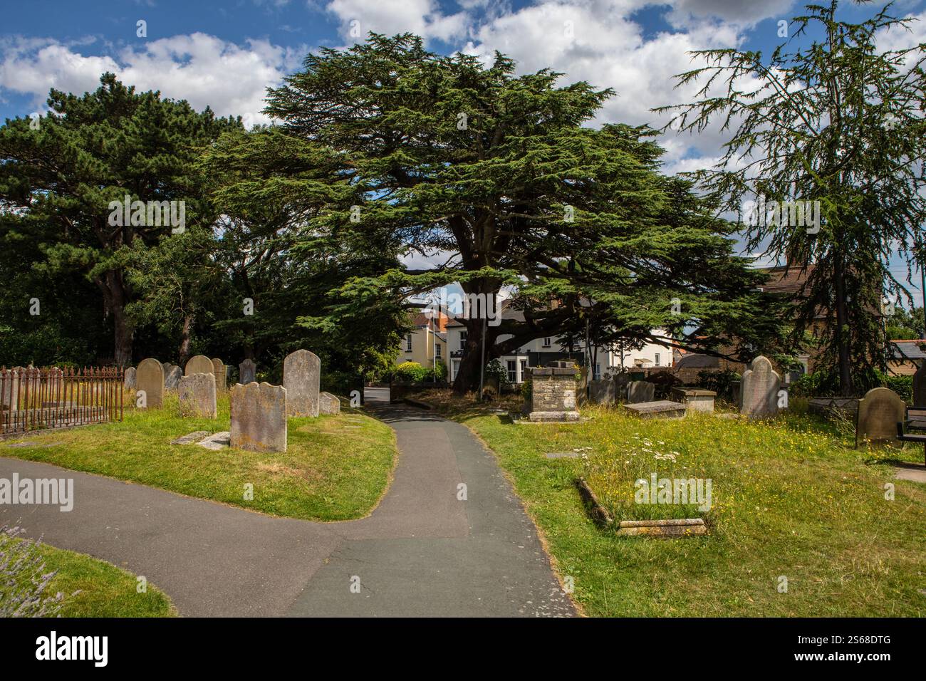 A view in the churchyard of Holy Trinity church in the market town of ...