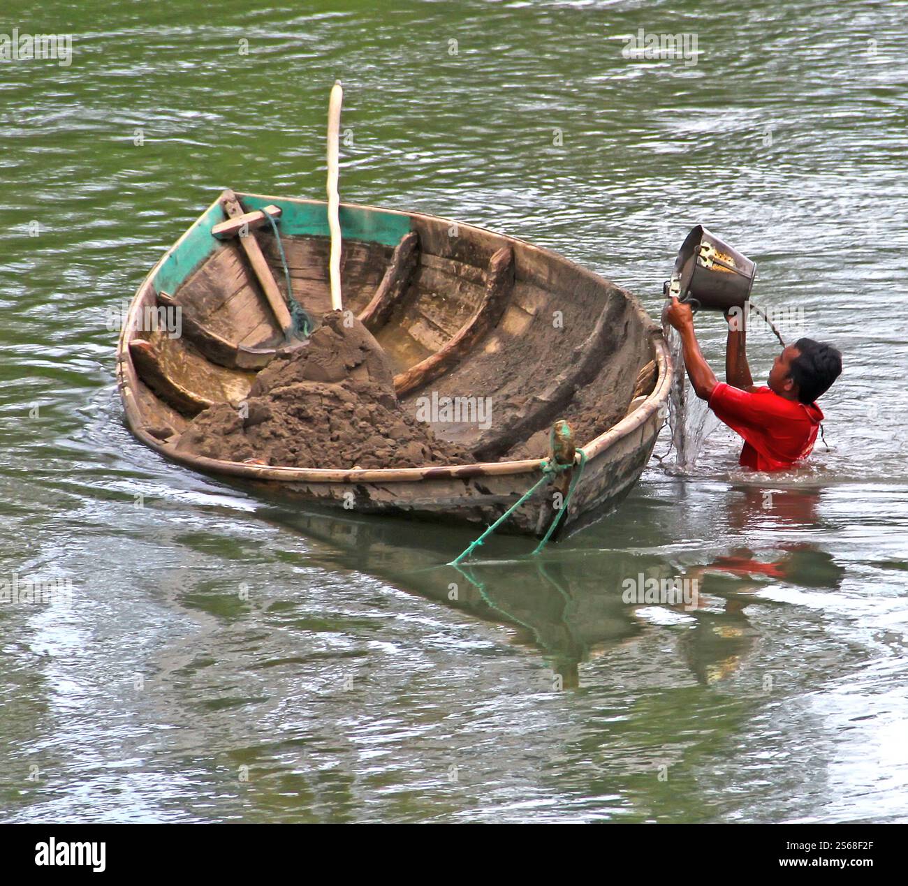 Dredging boat collecting sand from hi-res stock photography and images ...