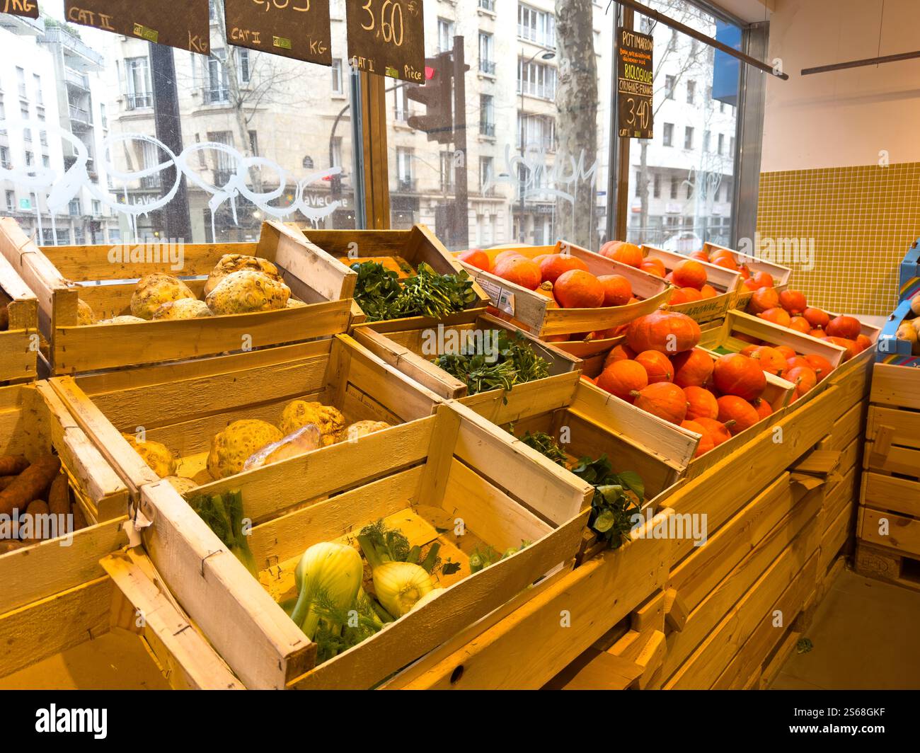 Colorful produce arrangement in a market during daylight hours Stock ...