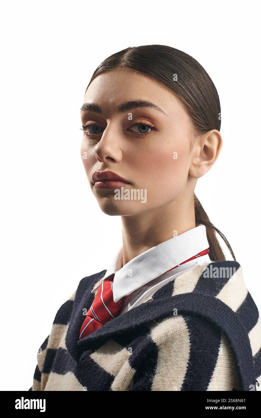 A beautiful young woman showcases deep emotions with a contemplative ...