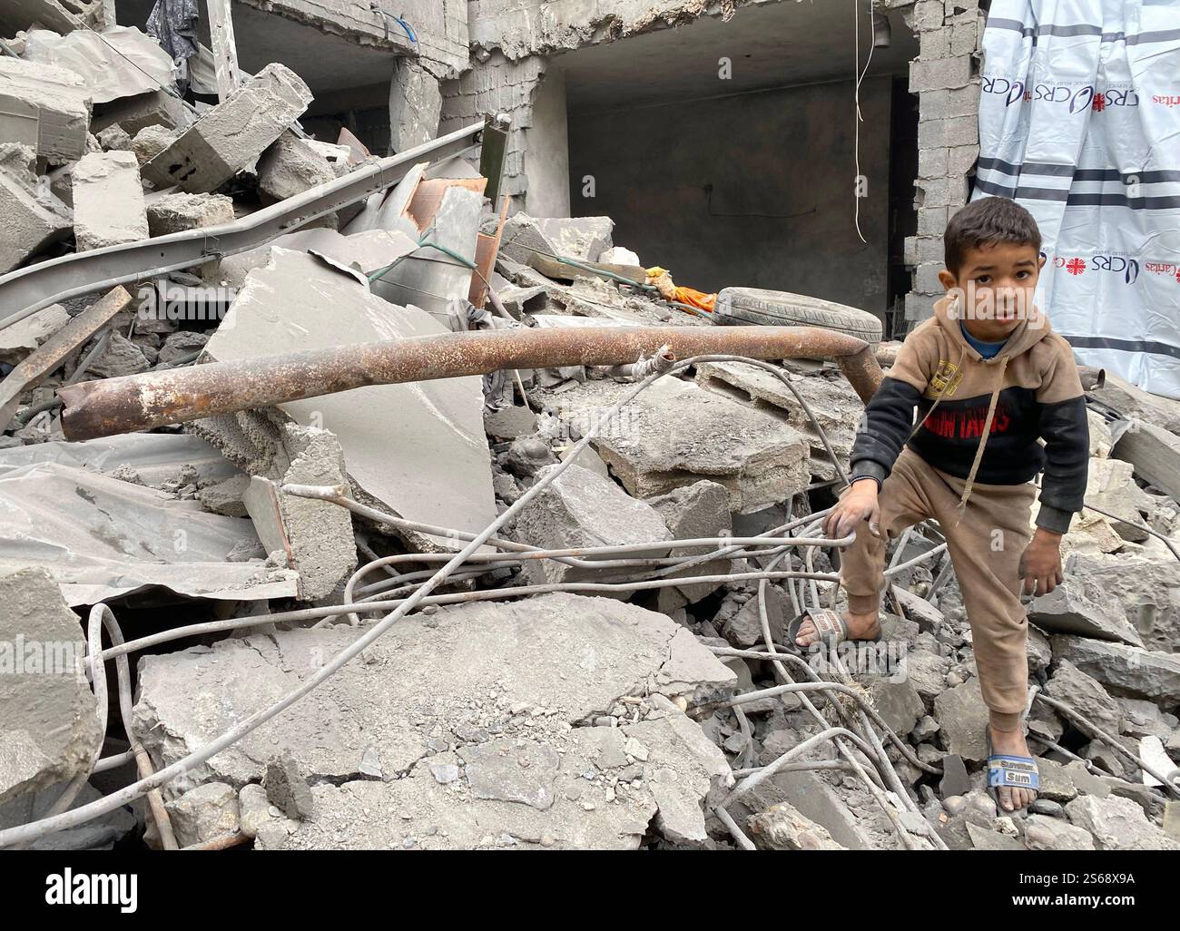 People check the rubble of buildings hit in Israeli strikes the ...
