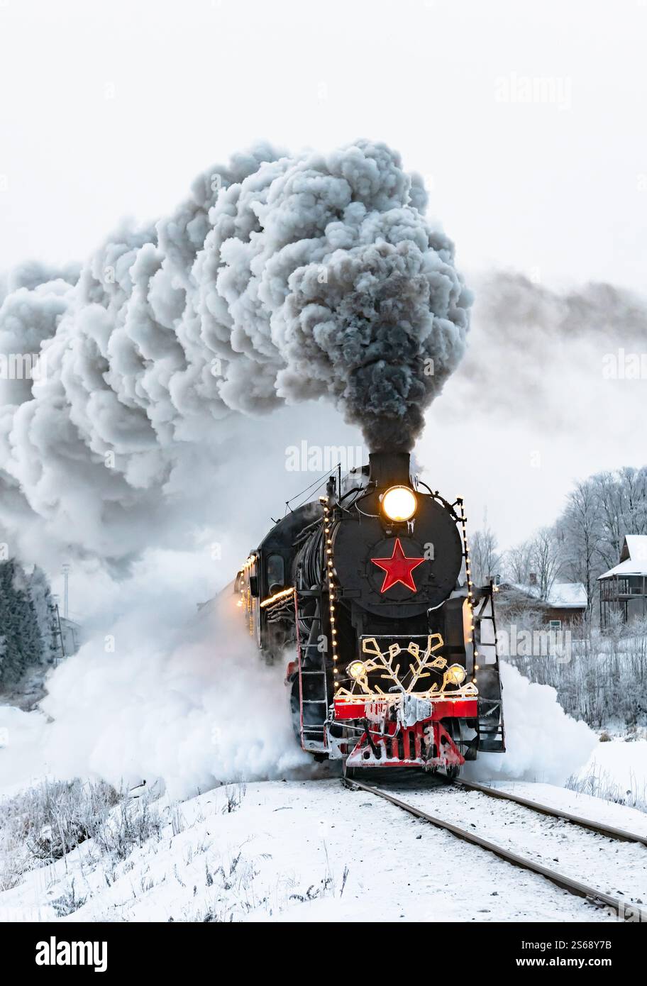 Retro steam locomotive in snowy winter landscape Stock Photo - Alamy