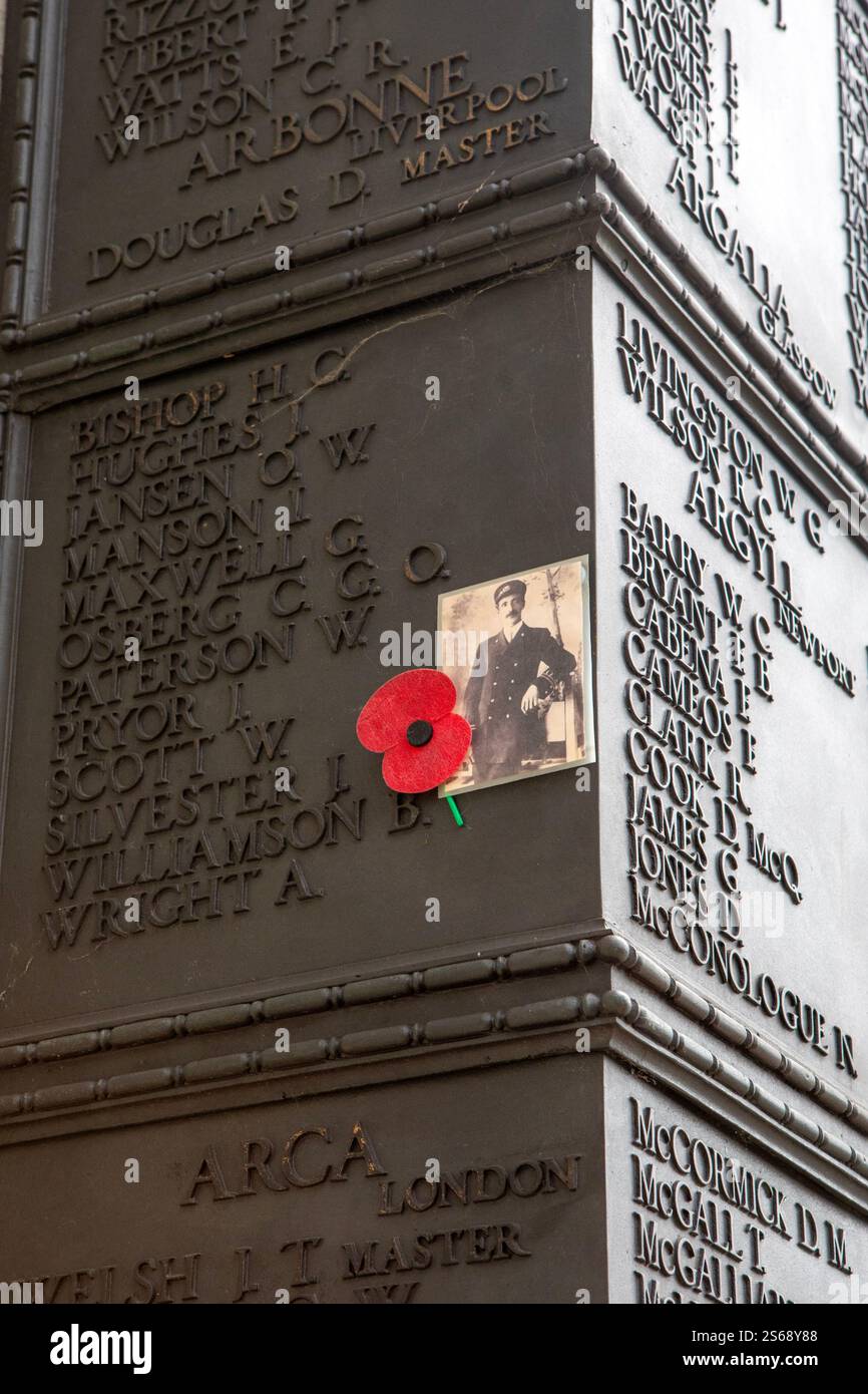 London, UK - July 22nd 2024: Photograph and poppy at the Tower Hill ...