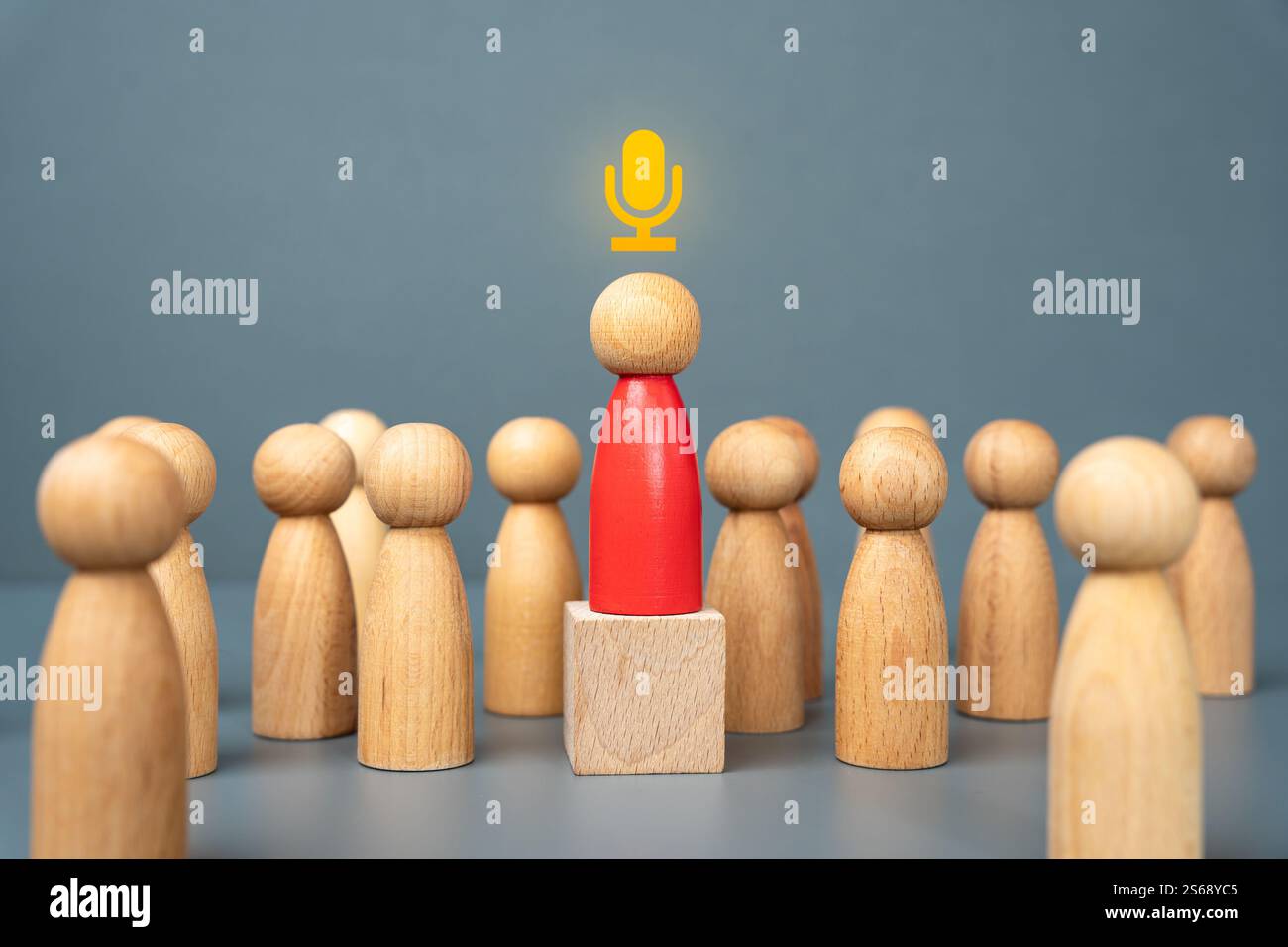 A man at a podium delivering a speech to his audience. Podcast or ...