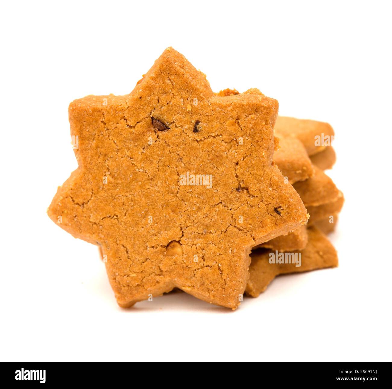 Cinnamon and chocolate chip cookies, seven point star shape, isolated ...