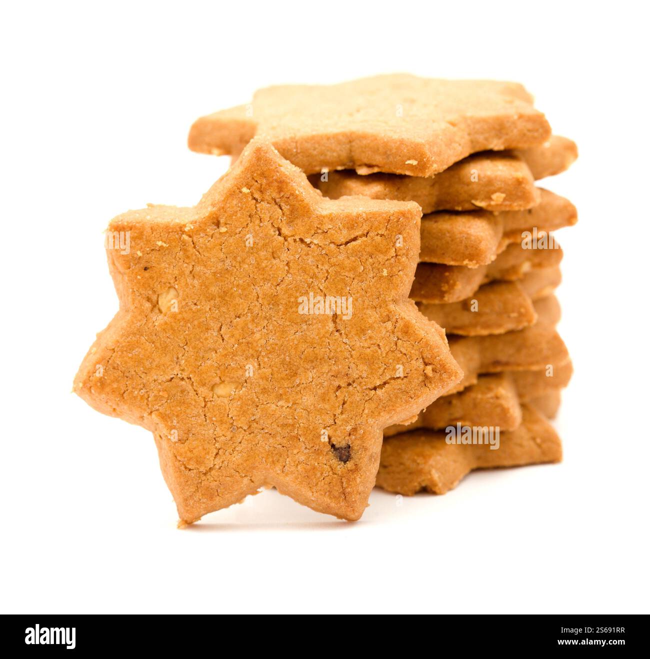 Cinnamon and chocolate chip cookies, seven point star shape, isolated ...