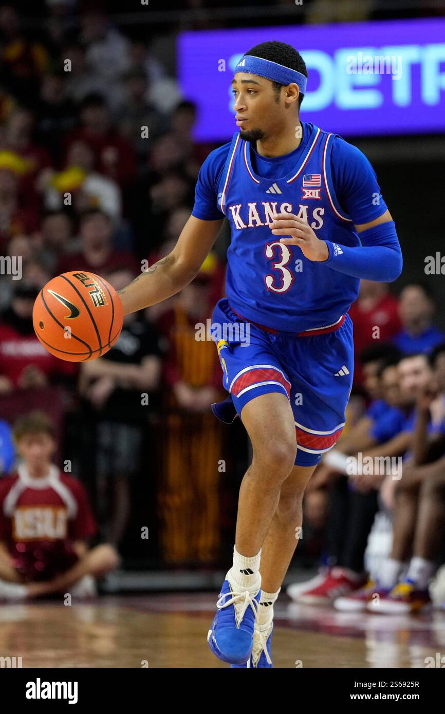 Kansas guard Dajuan Harris Jr. (3) drives up court during the first ...