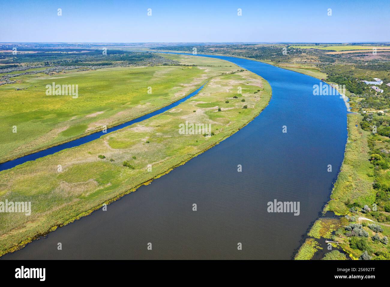 The majestic Southern Bug River winds through lush green landscapes ...