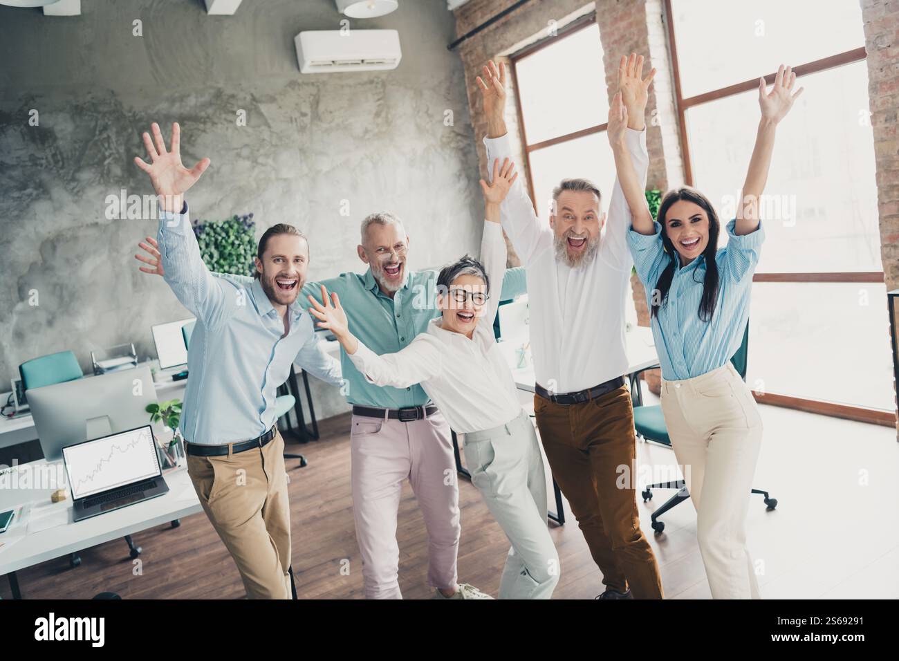 Photo of coworking project teamwork people stretch hands excited ...