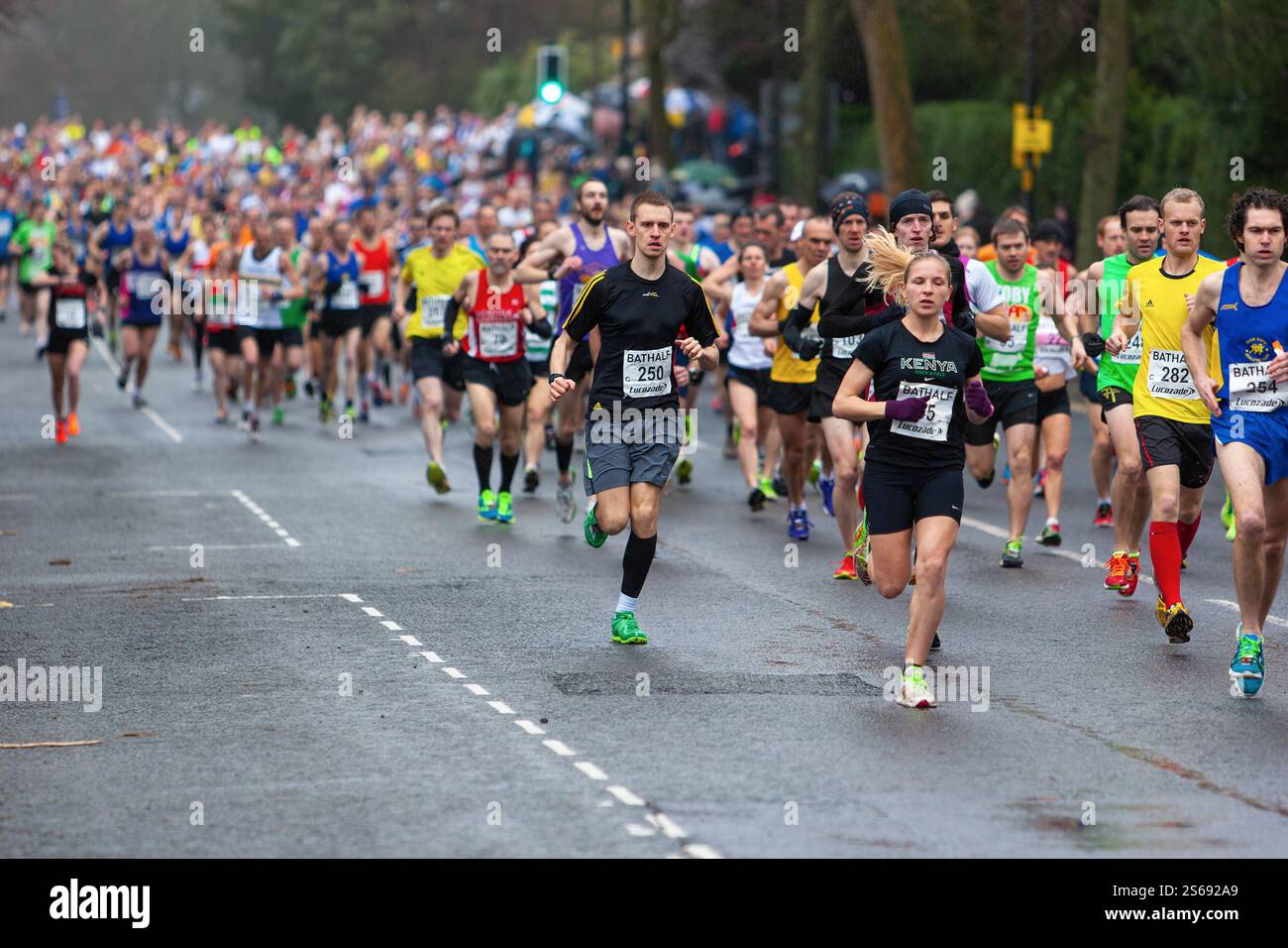 Male and female athletes running and competing in the Bath Half ...