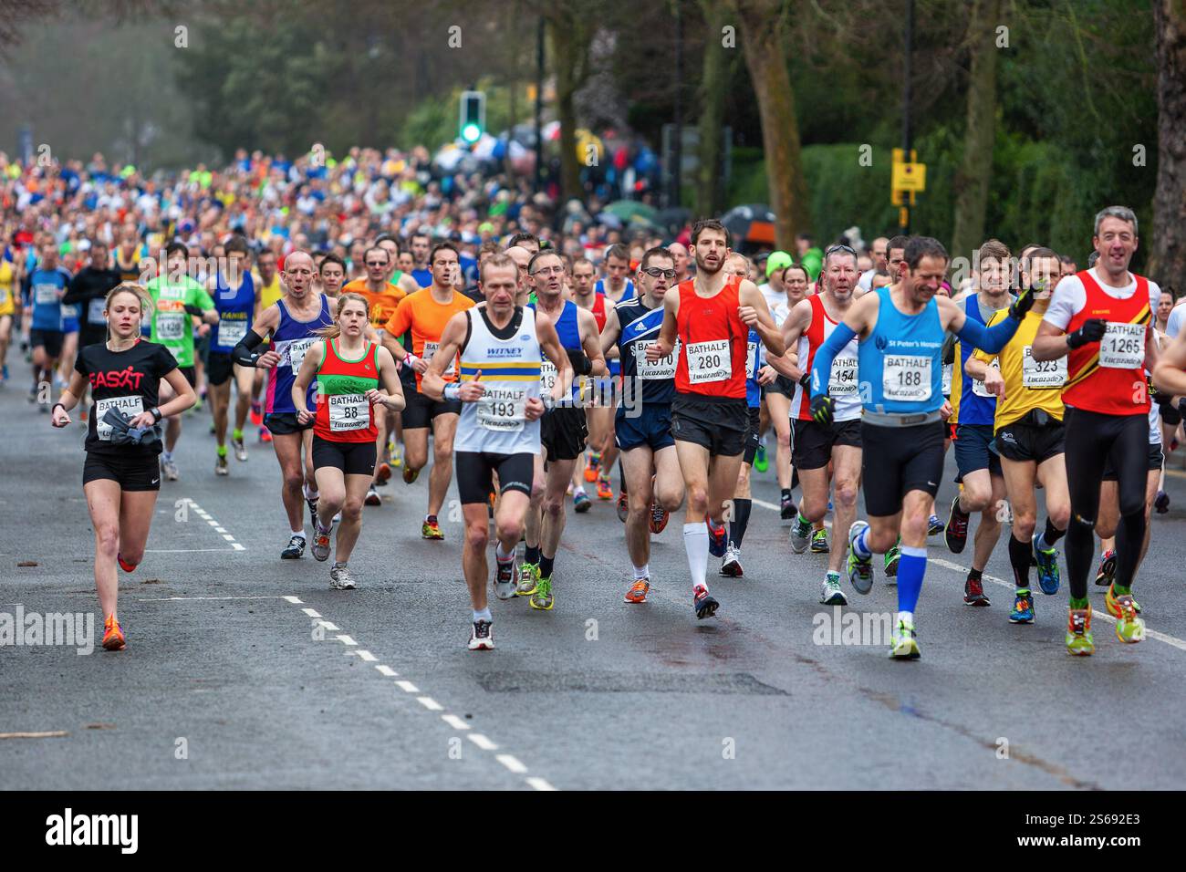 Male and female athletes running and competing in the Bath Half ...