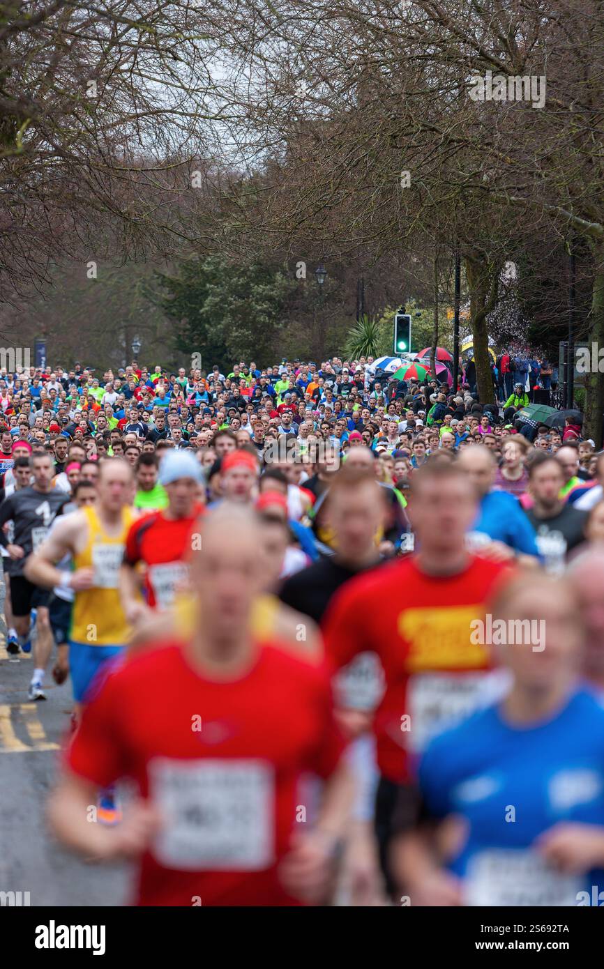 Male and female athletes running and competing in the Bath Half ...