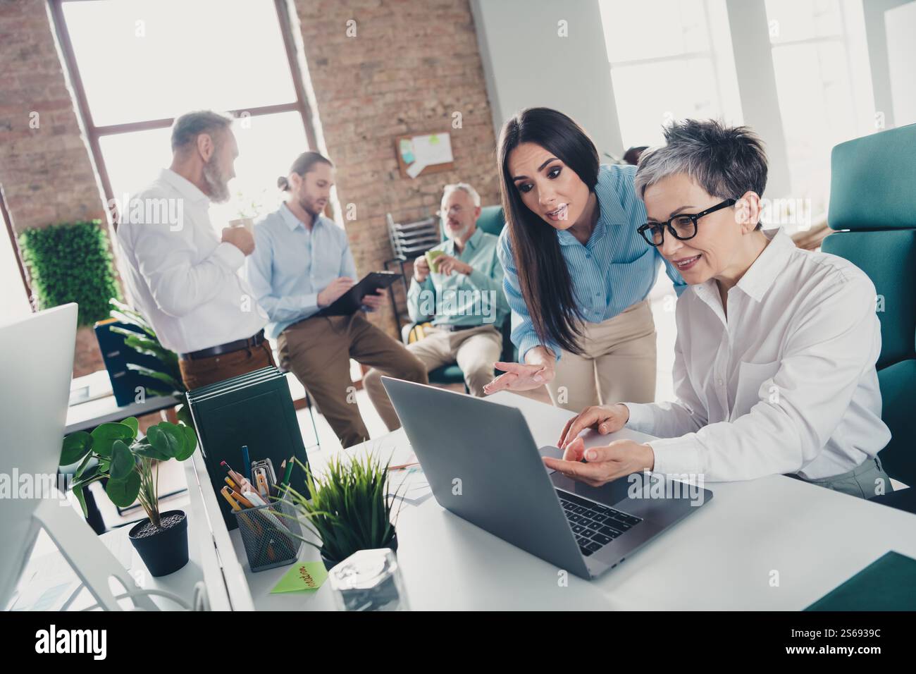 Photo of teamwork people working together project comfortable modern ...